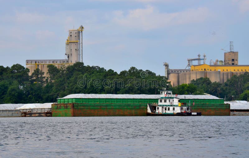 Tugboat pushing ship stock image. Image of white, water - 31614207