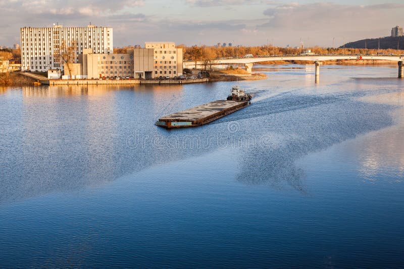 Tugboat pushing barge stock image. Image of freight - 259378407