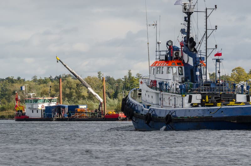 Tugboat and Self Propelled Working Barge Stock Photo - Image of ...