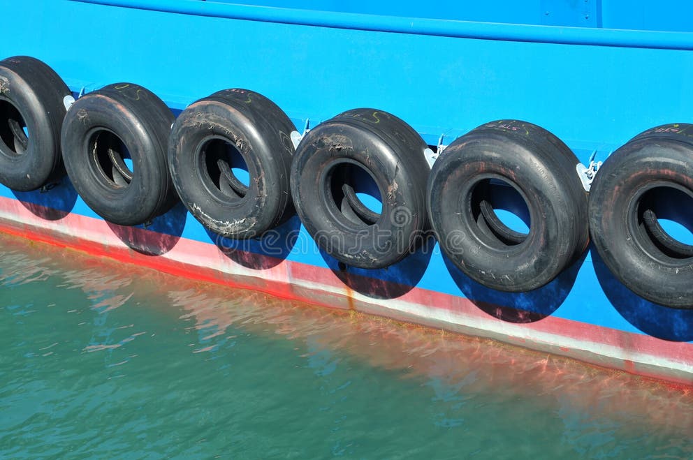 Tugboat side stock photo. Image of port, hull, blue, industry - 60221422