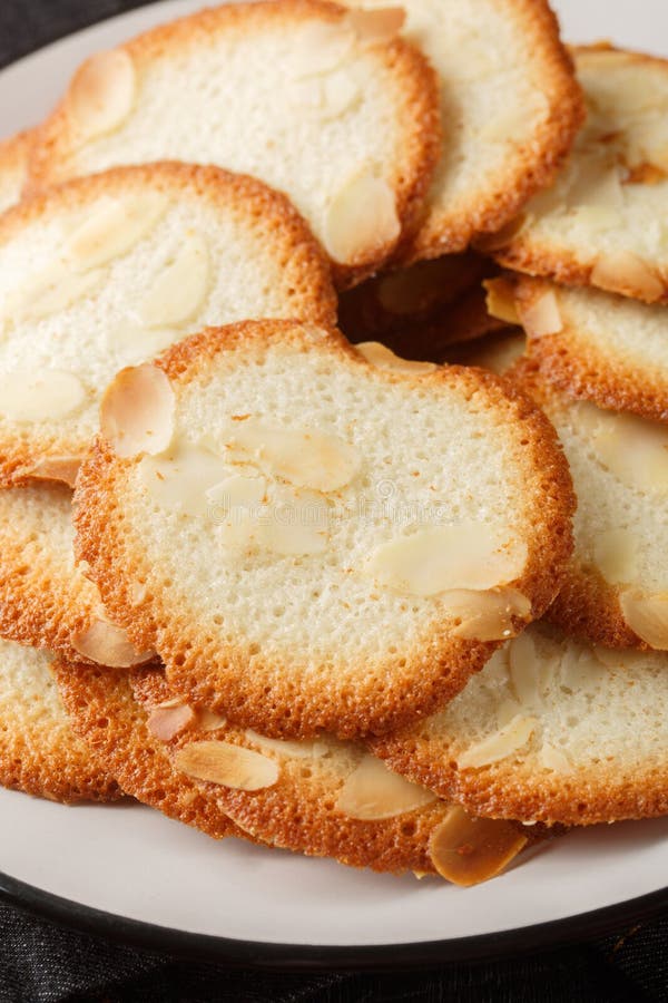 Tuile is a Thin, Crisp Sweet Cookie or Wafer Made of Dough Closeup on ...