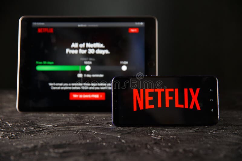Tula 24 09 2019: Netflix Logo on the Tablet and Phone Display ...