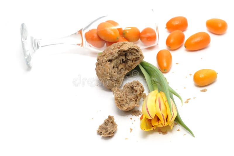 Tulip, bread and kumquats stock image. Image of background - 4651717