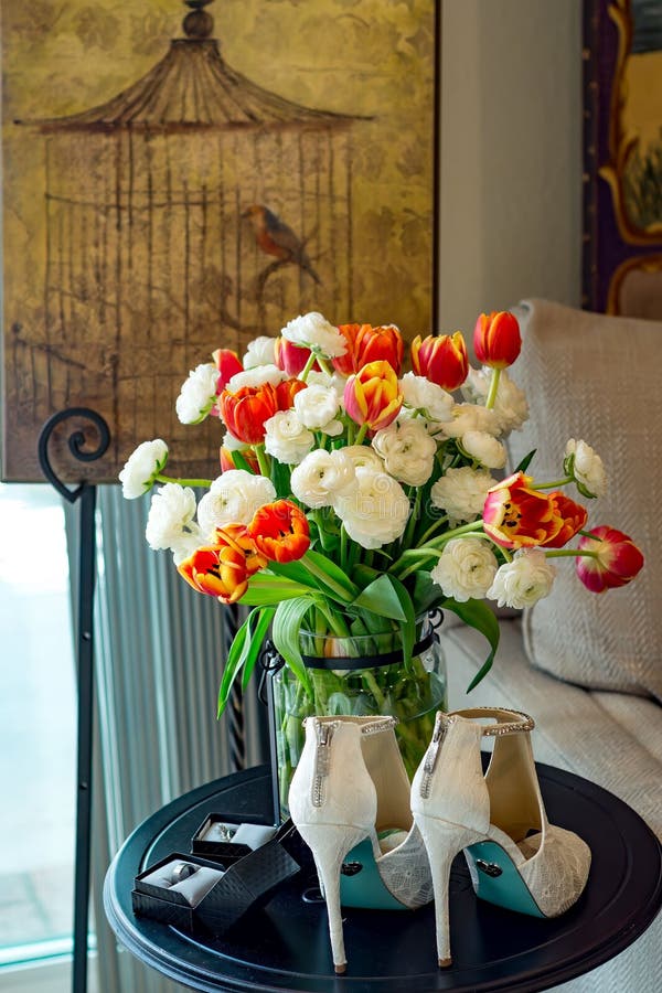 Tulips and White Roses in a Vase on a Side Table Stock Photo - Image of ...