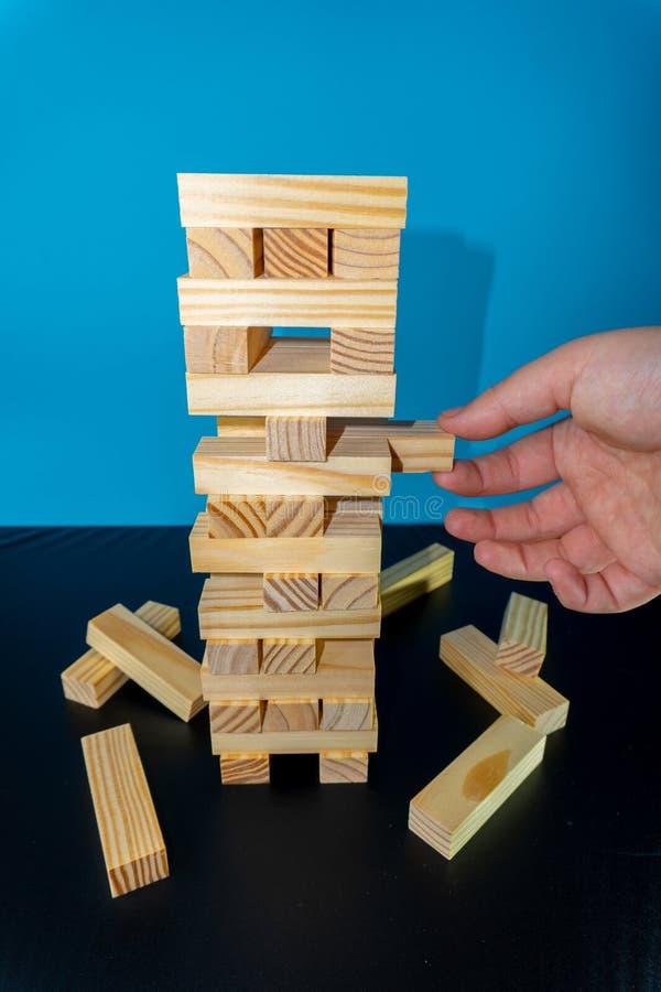Tumble Tower Wooden Block Game Stock Image - Image of brother, build ...