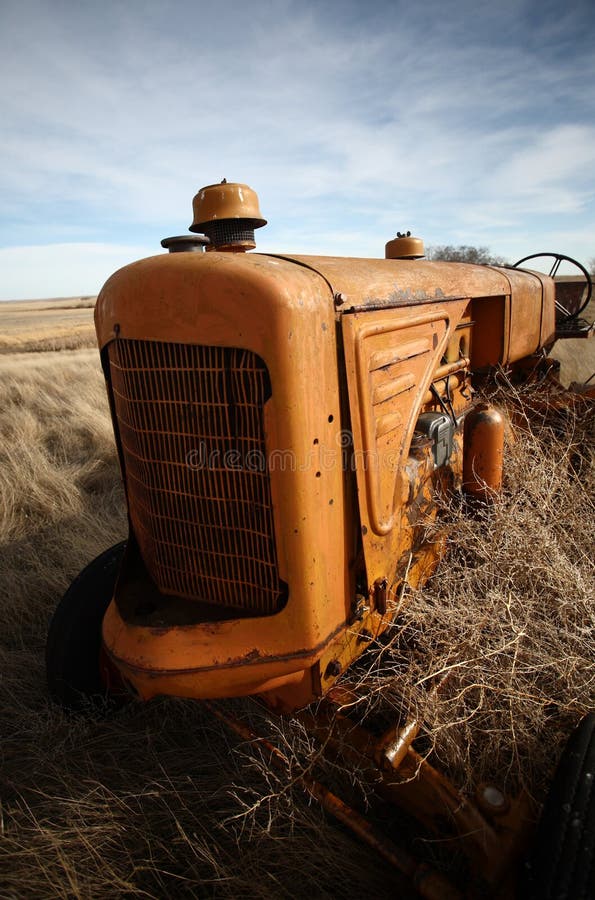 Tumbleweeds Piled Against Abandoned Tractor Stock Image - Image of ...