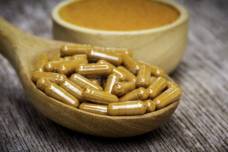 Tumeric capsule. stock image. Image of health, ingredient - 34925009