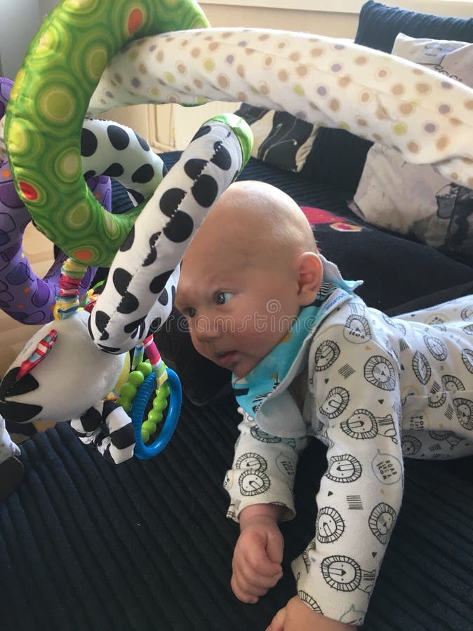 Tummy time stock photo. Image of baby, time, tummy, playing - 126484320