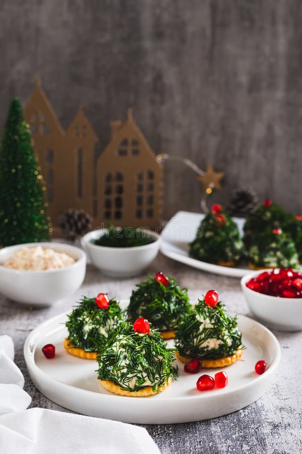 Tuna, Egg and Dill Salad Shaped Like Christmas Trees on Crackers on a ...