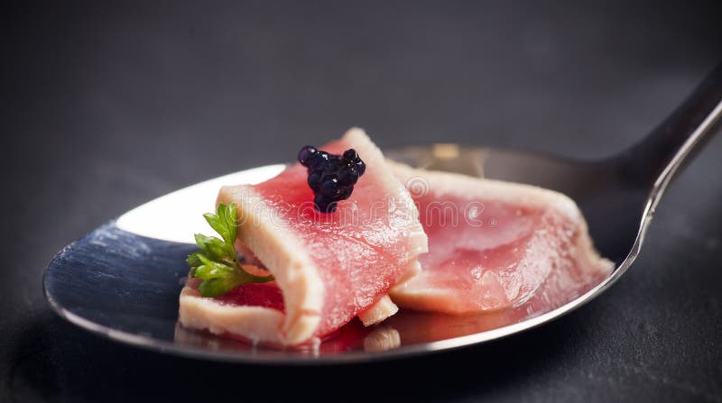 Tuna on a spoon stock photo. Image of tunafish, food - 74185328