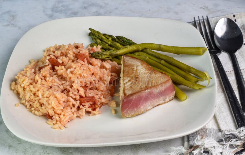 Tuna Steak with Rice and Asparagus Stock Image - Image of meat, salad ...
