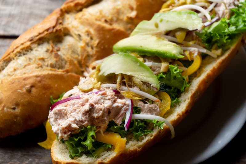 Tuna Sub Sandwich in Rustic Baguette with Avocado, Olives and Sprouts ...