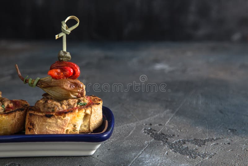 Tuna Tapas with Onion, Pepper and Capers Stock Photo - Image of garlic ...