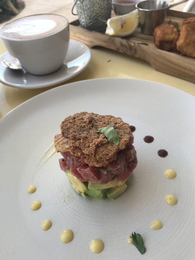 Tuna Tartar with Smashed Avocado and Crispy Fried Tempeh Stock Image ...