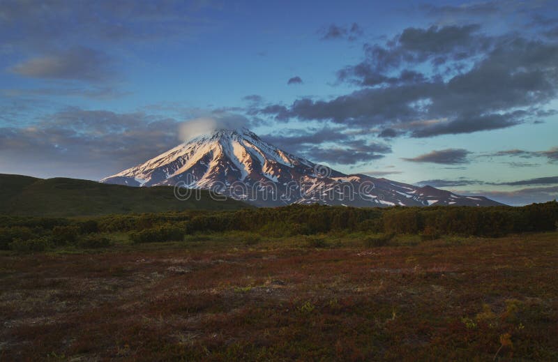 Tundra, volcano, sunset stock image. Image of rock, tree - 28202349