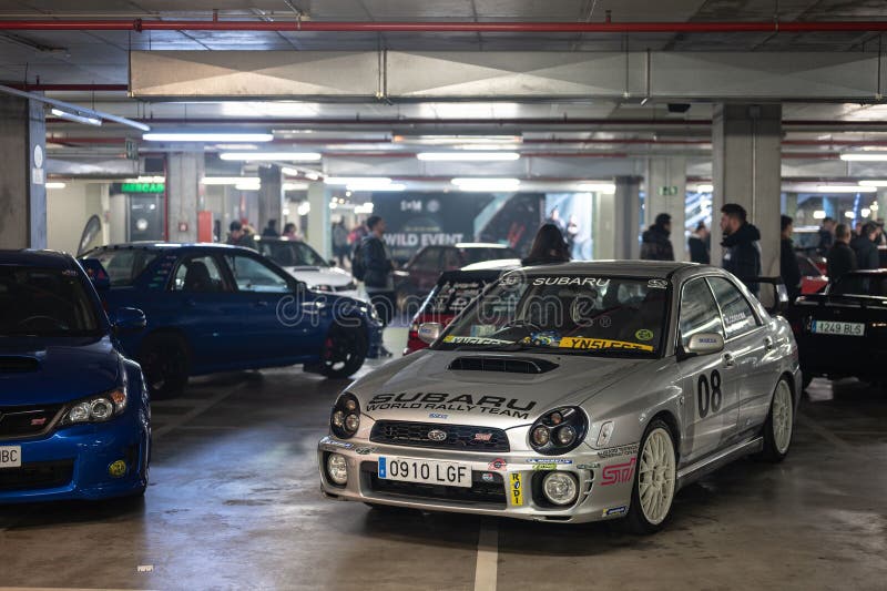 Tuned Silver Second Generation Subaru Impreza STI in an Indoor Parking ...