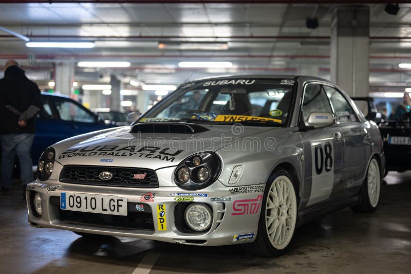 Tuned Silver Second Generation Subaru Impreza STI in an Indoor Parking ...