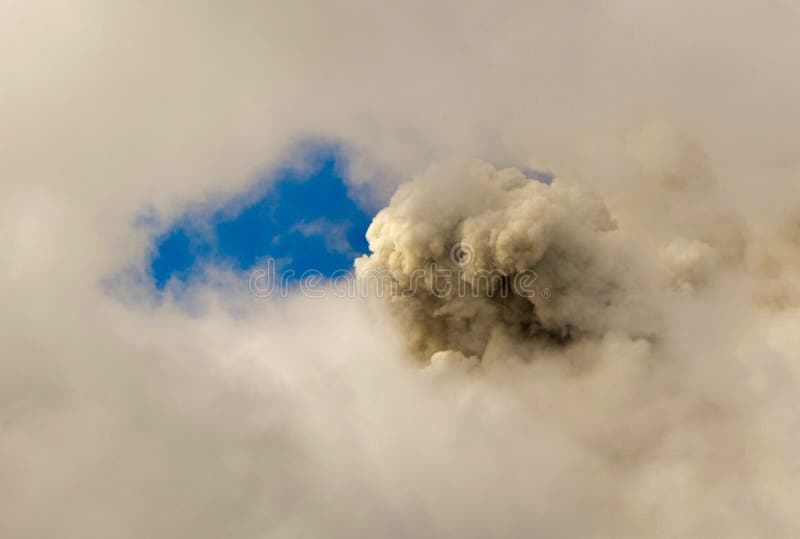 Tungurahua Volcano Eruption through the Clouds Stock Photo - Image of ...