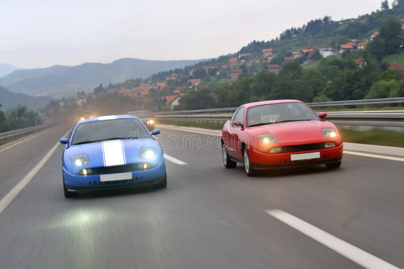 Tuning Cars Racing Down the Highway Stock Image - Image of elegant ...