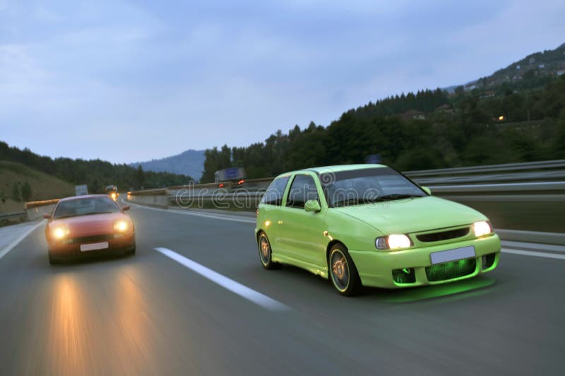 Tuning Cars Racing Down the Highway Stock Image - Image of modern ...