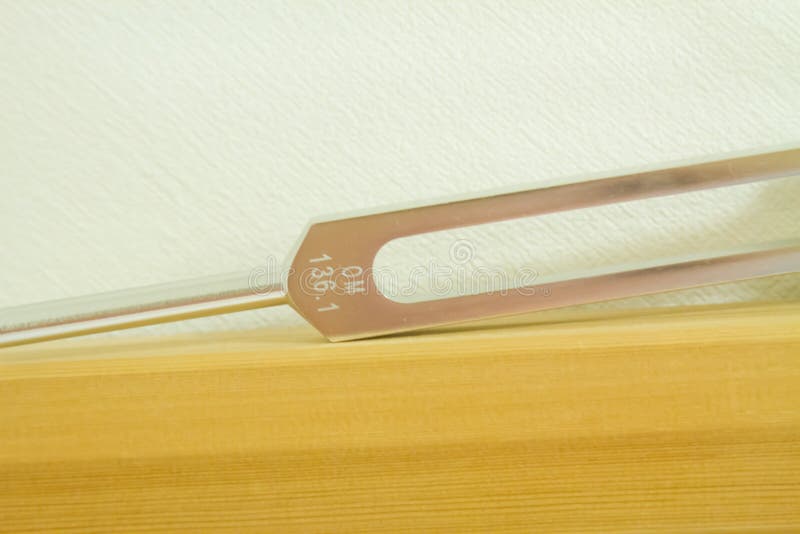 Tuning Fork and Crystal Stone on a Table . Stock Photo - Image of ...