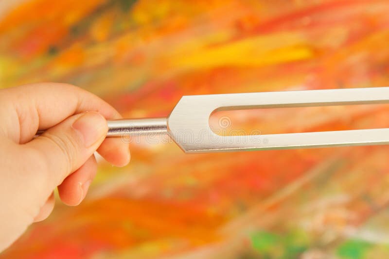 Tuning Fork and Crystal Stone on Table . Stock Image - Image of musical ...