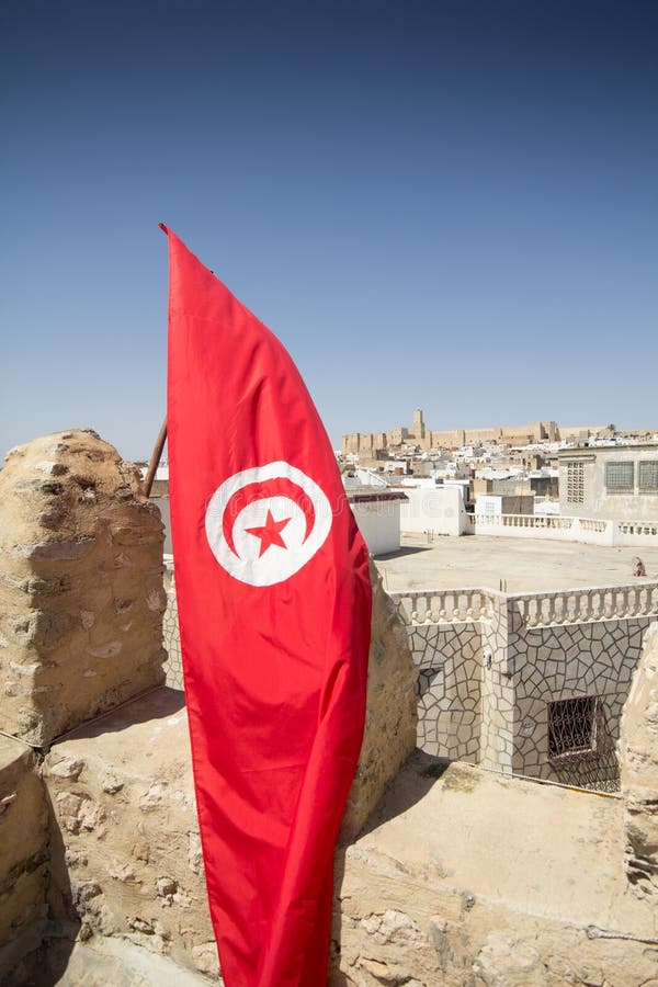 Tunisian flag in Sousse stock photo. Image of building - 20786550