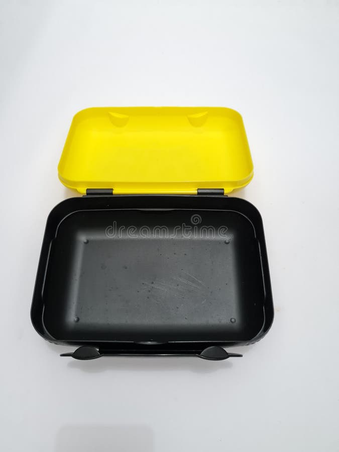 Tupperware Black and Yellow Combination Lunch Box Made of Plastic Stock ...