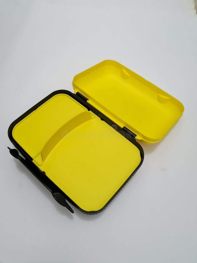 Tupperware Black and Yellow Combination Lunch Box Made of Plastic Stock ...