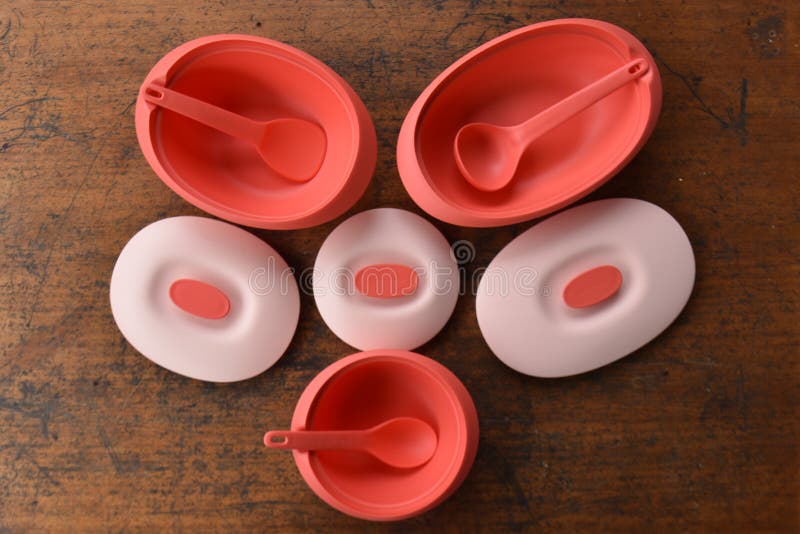 Tupperware Serving Set with Wood Table Background Stock Photo - Image ...