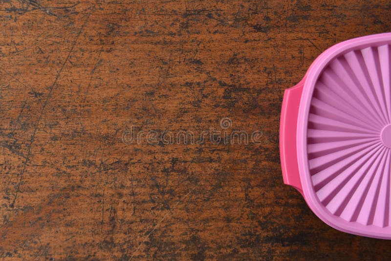 Tupperware Serving Set with Wood Table Background Stock Image - Image ...