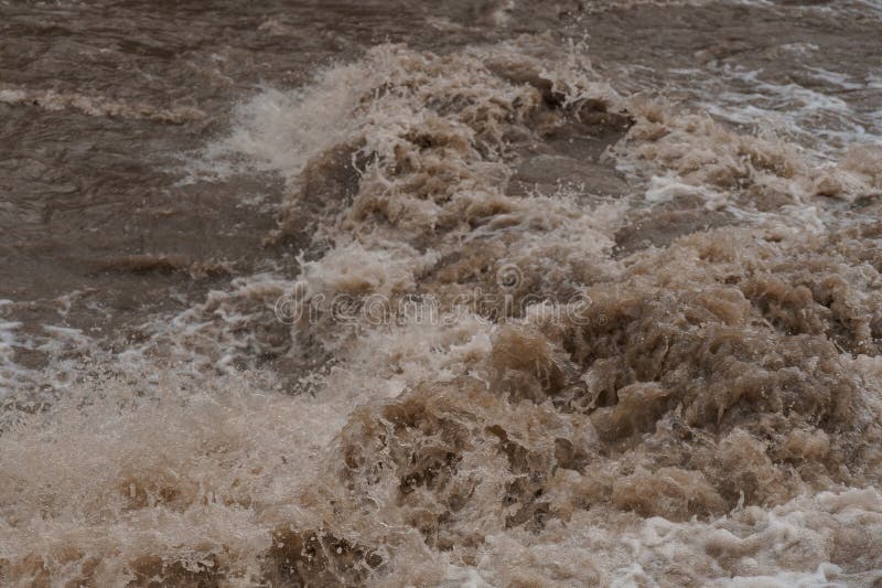 Turbulent Brown Waters: a Close-Up of Raging River Waves Stock Photo ...
