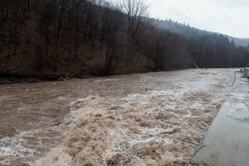 Turbulent Waters: a Raging River Amidst Rain-Drenched Landscape Stock ...
