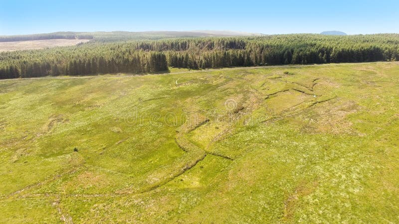 Turf Banks for Cutting Peat with a Spade in a Moss Bog in Ireland Stock ...