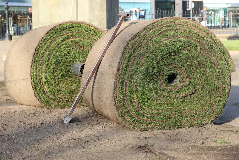 Turf Rolls and Gardener in Edinburgh Stock Photo - Image of tool, park ...