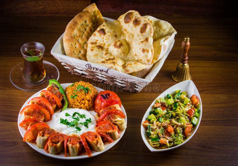 Turkish Beyti Kebap Garnished with Vegetables Stock Image - Image of ...