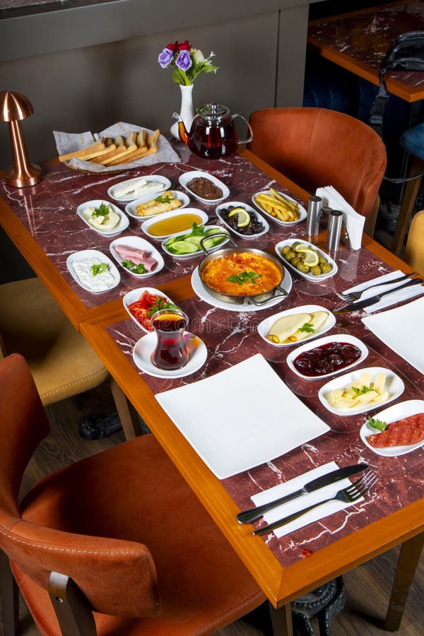 Turkish Breakfast Spread Featuring Various Dishes in a Cozy Setting ... Turkish Breakfast Spread Featuring Various Dishes in a Cozy Setting ...
