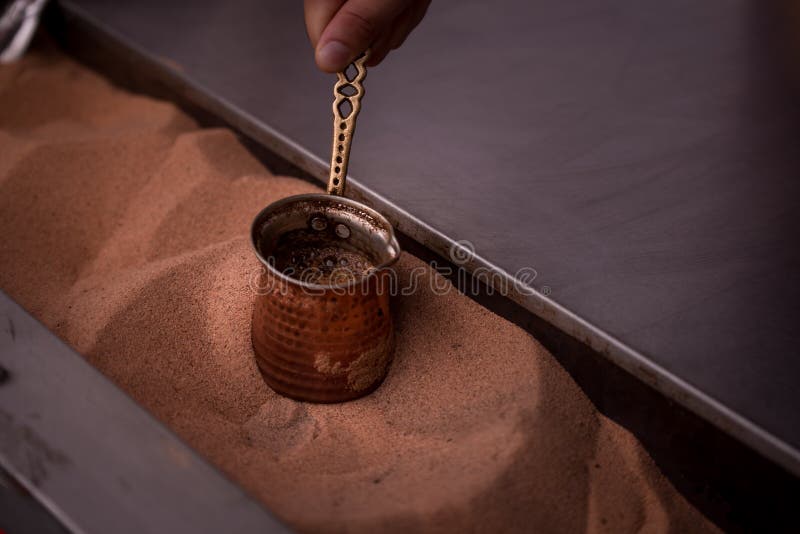 Turkish Coffee Boiled in Sand in a Kettle Stock Photo - Image of ...