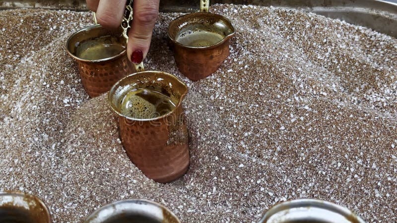Turkish Coffee Boiling in Hot Sand Stock Footage - Video of preparation ...