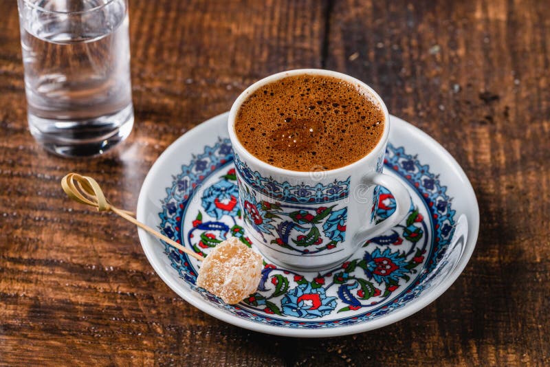 Turkish Coffee in Classic Coffee Cup with Water and Turkish Delight on ...