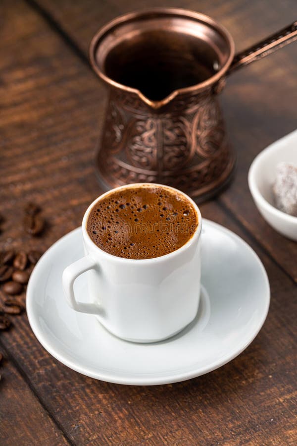Turkish Coffee in Classic Coffee Cup with Water and Turkish Delight on ...