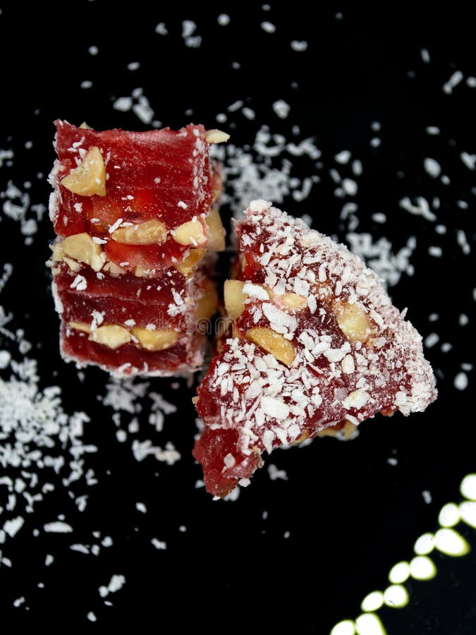 Turkish Delight. Red Lokum with Nuts and Coconut Flakes Stock Image ...