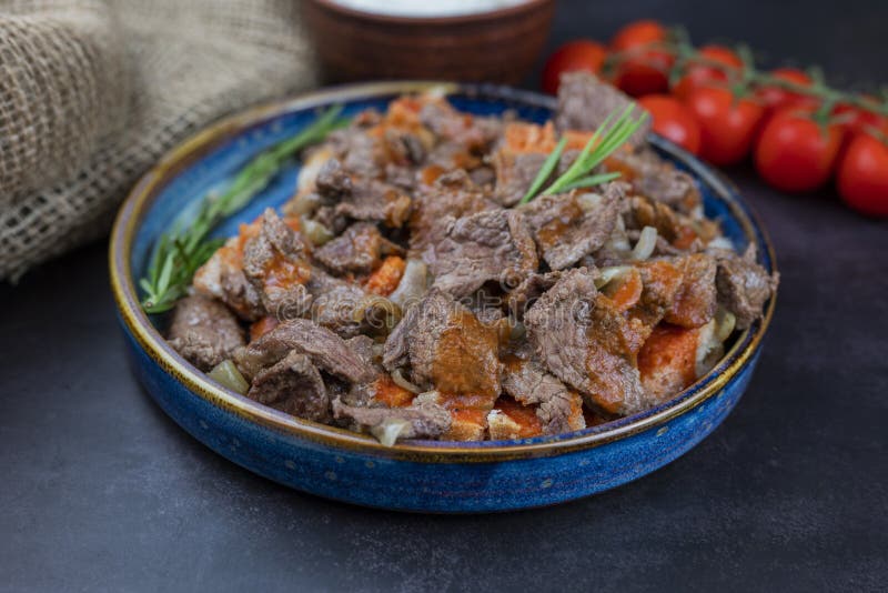 Iskander Kebab is a Turkish Dish with Meat, Spices and Vegetables on a ...