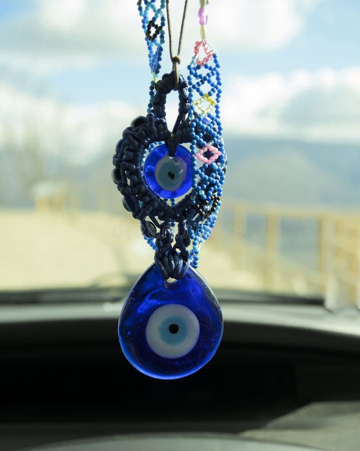 Turkish Eye Hanging with Vertical Vibrant Colors on Car Windshield ...