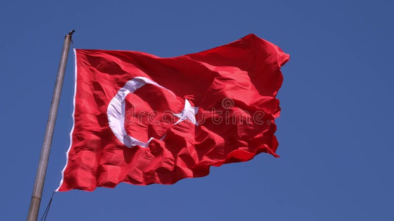 Turkish Flag Flying from the High Place and Blue Lake in the Background ...