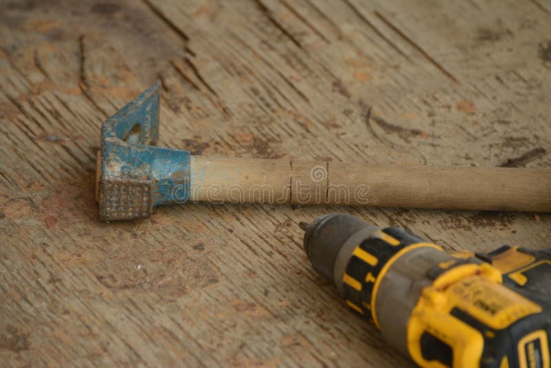 Turkish Hammer and Electric Drill on a Workbench Stock Photo - Image of ...
