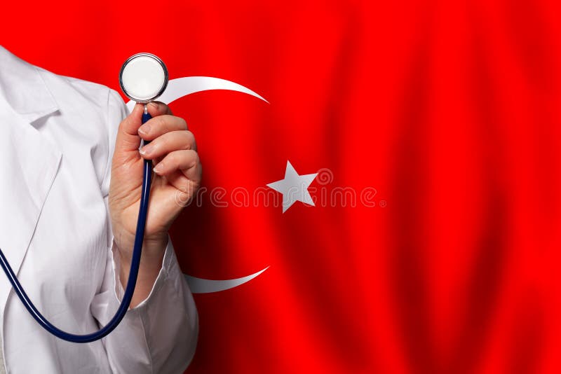 Turkish Doctor`s Hand Showing Thumb Up Positive Gesture on Flag of ...