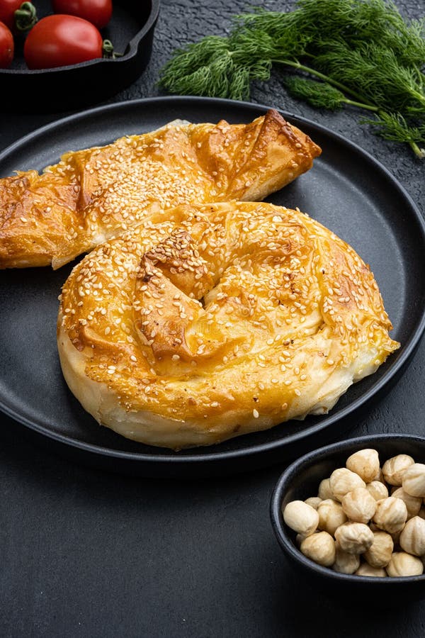 Turkish Pastry Filled with Cheese, on Black Dark Stone Table Background ...