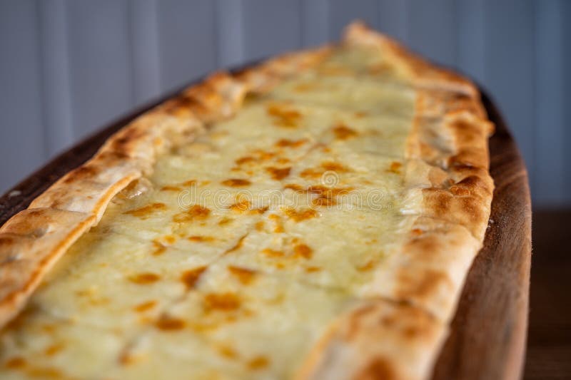 Turkish Pide with Cheese. Pita is Traditional Turkish Pizza Stock Photo ...