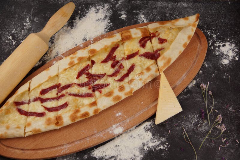 Turkish Pizza in the Form of a Boat is Called a Pied, Topped Baked ...